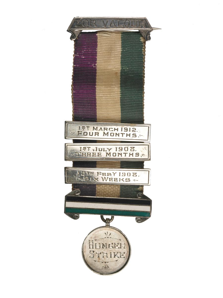 Silver Hunger Strike medallion with purple, white and green ribbon ...