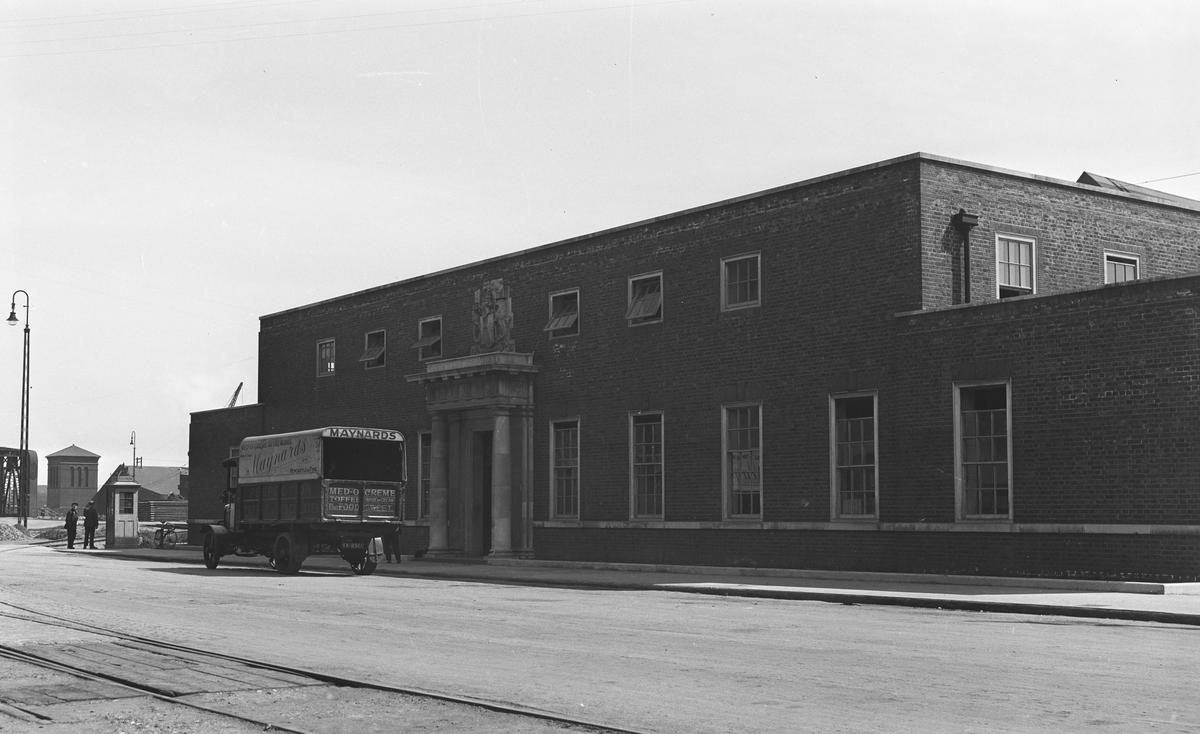 West India Docks: A Maynards Toffees lorry stands outside one of the ...