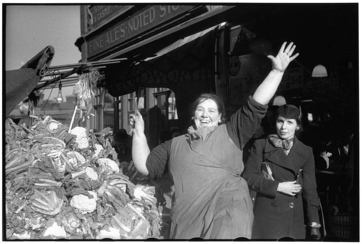 A female cauliflower seller at Brixton market | London Museum