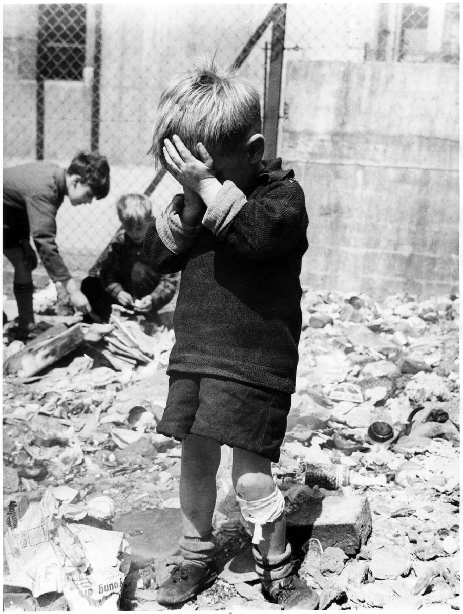 Boys playing on a bomb site, off Harrow Road, Paddington | London Museum