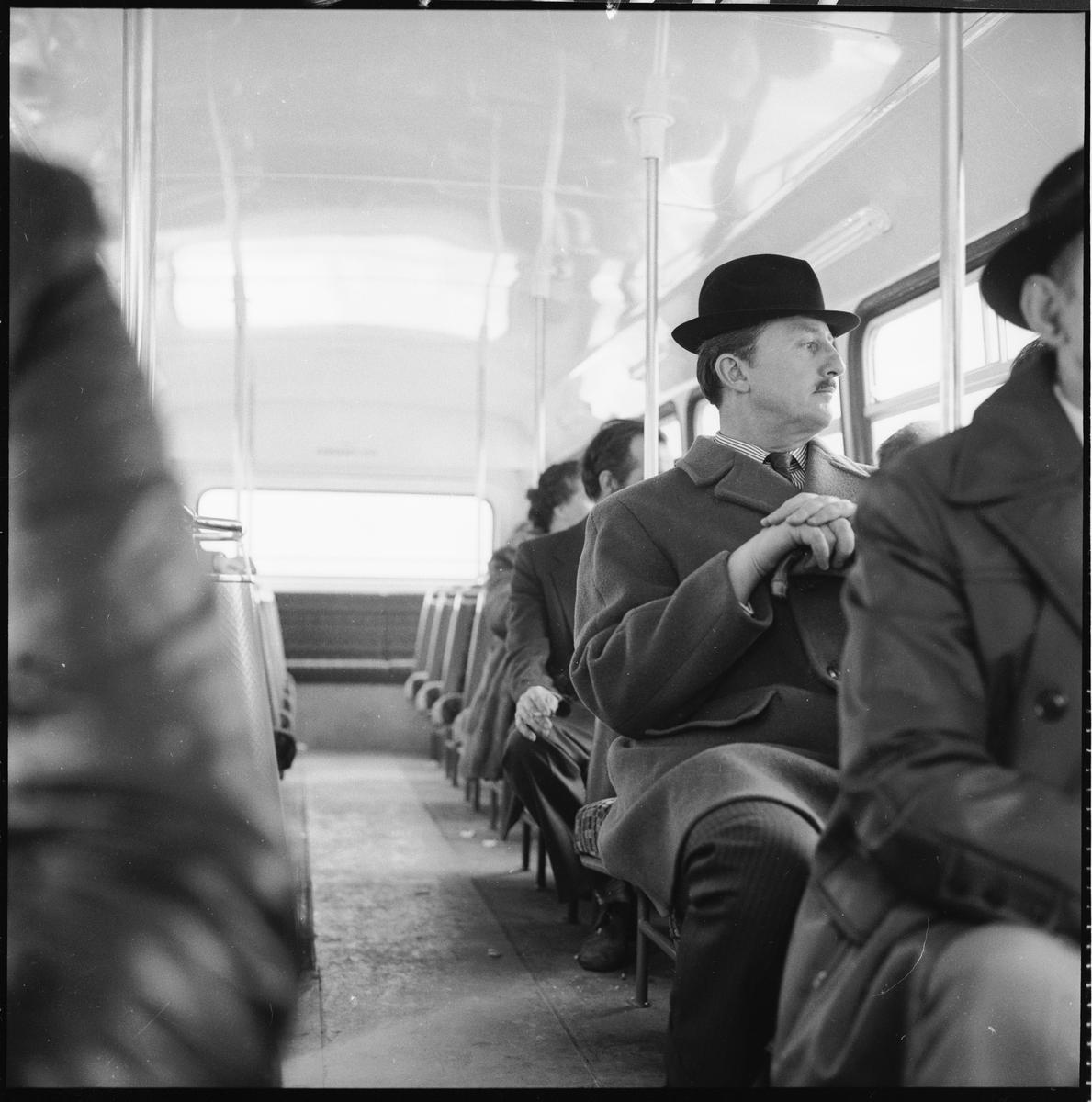 City gent on the top deck of a London bus | London Museum
