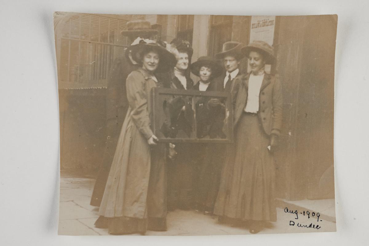 Suffragettes Holding a Broken Window Pane | London Museum