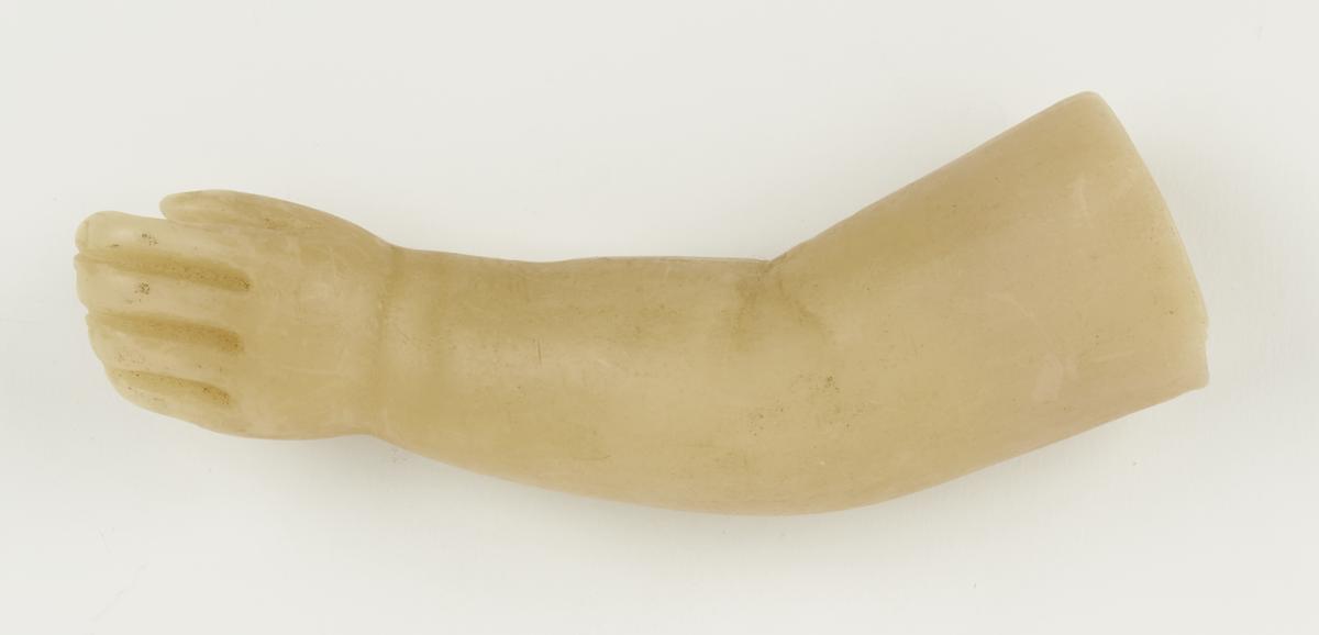Doll, doll's arm | London Museum